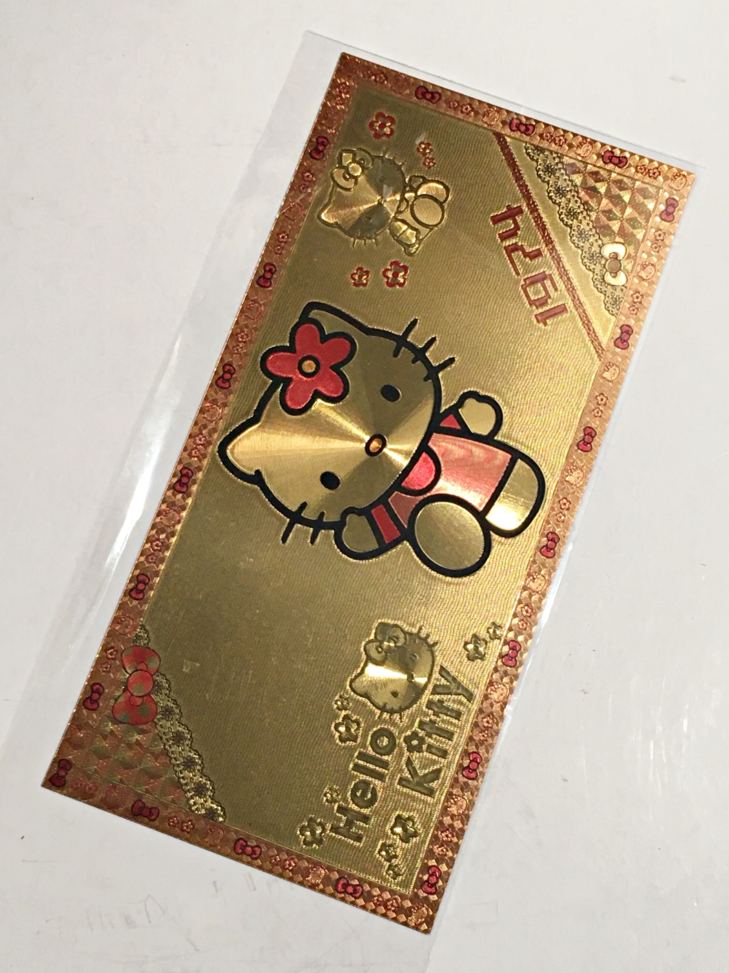 1974 Hello Kitty Gold Foil Banknote | Property Room