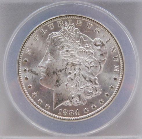 MINTED OUT OF THE SILVER FROM THE COMSTOCK LODE - 1884-O Brilliant ...