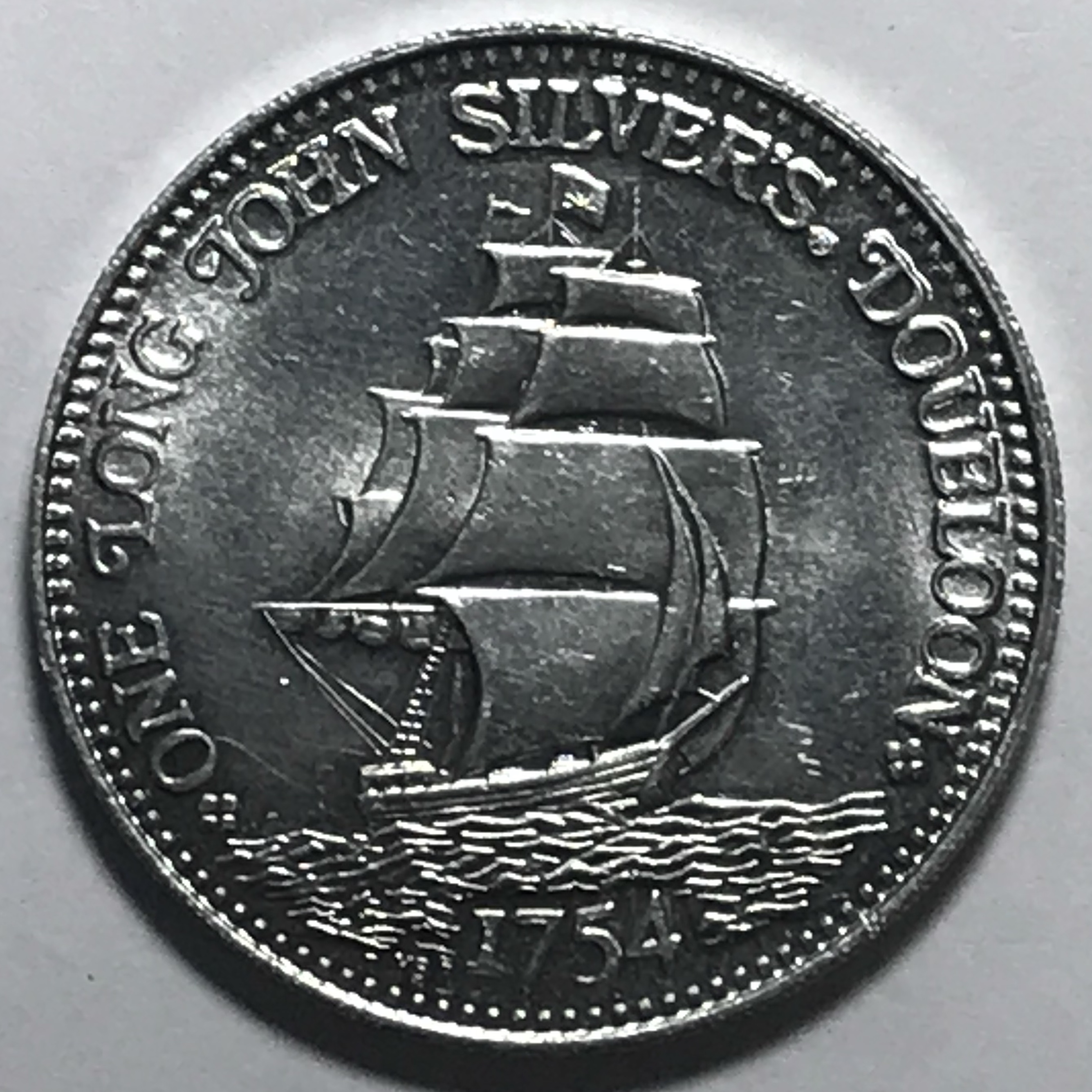 Long John Silver's Pirates Doubloon - Bart Bluebeard Coin | Property Room