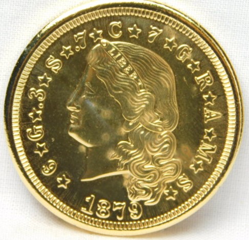1879 $4 Stella Flowing Hair Replica Coin | Property Room