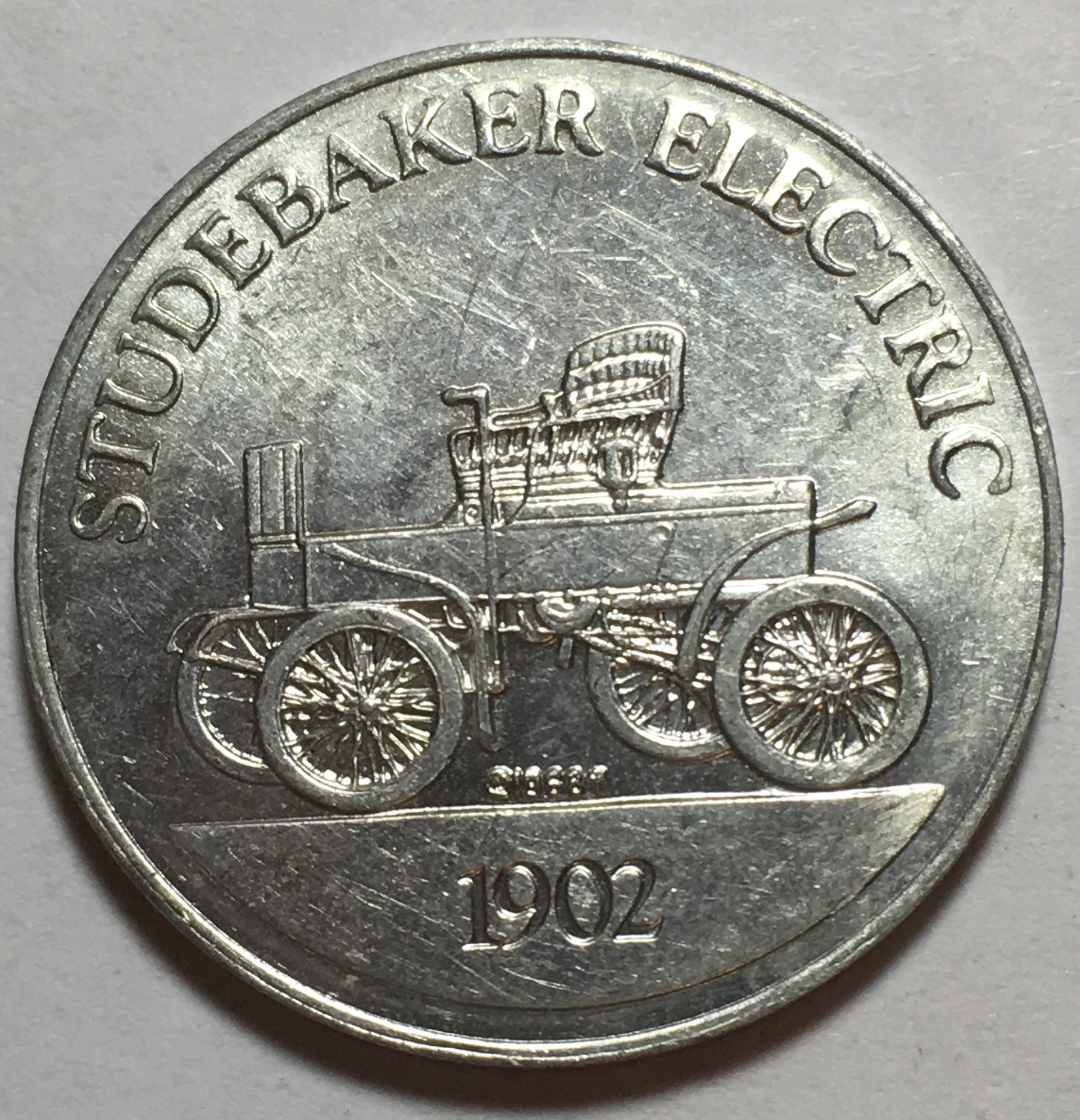 1902 Studebaker Electric Antique Car Commemorative Coin | Property Room