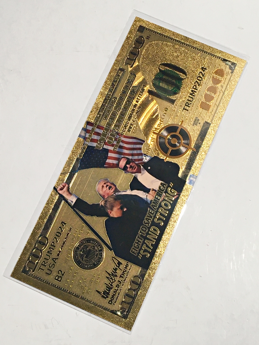 Donald J. Trump Gold Foil 100 Dollar Banknote | Property Room