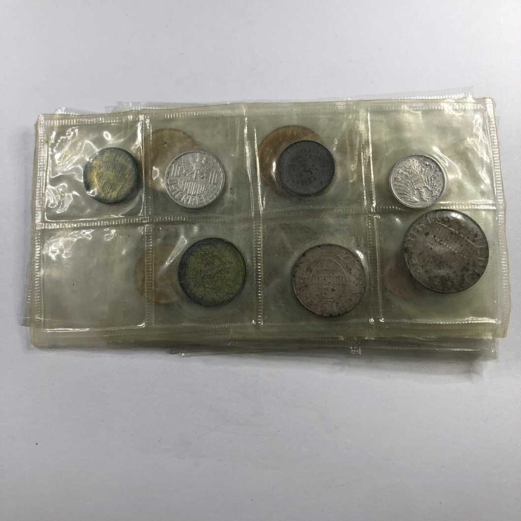 Lot of 19 World Coins*In Sealed Packets | Property Room
