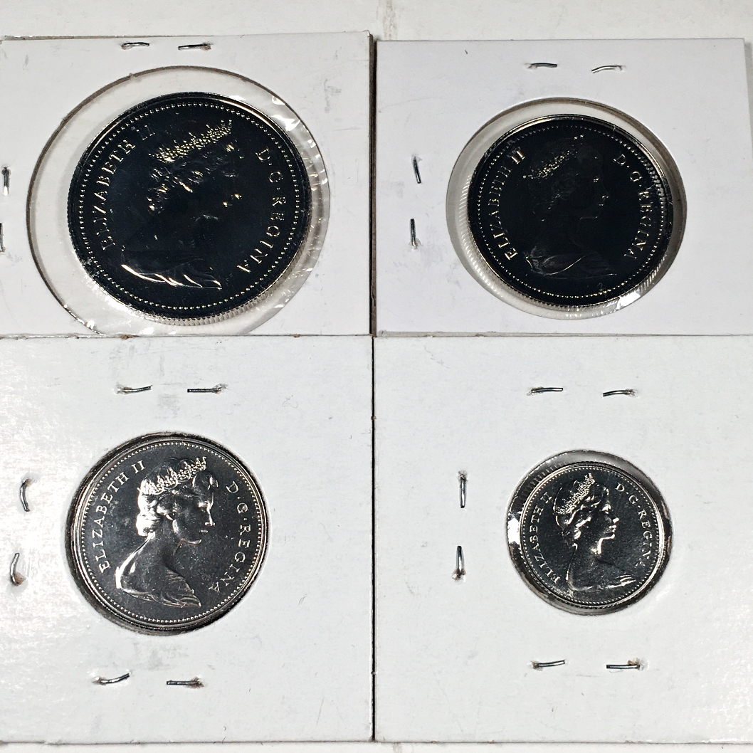 Lot of Four Brilliant Uncirculated Canadian Coins: 1980 $1, 1977 50c ...