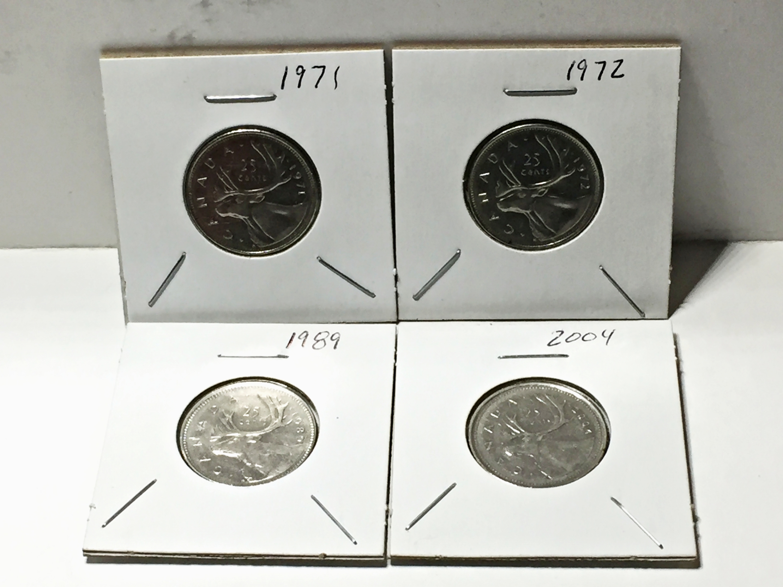 Lot of Four Canadian 25 Cents Coins: 2004, 1989, 1972 and 1971 ...