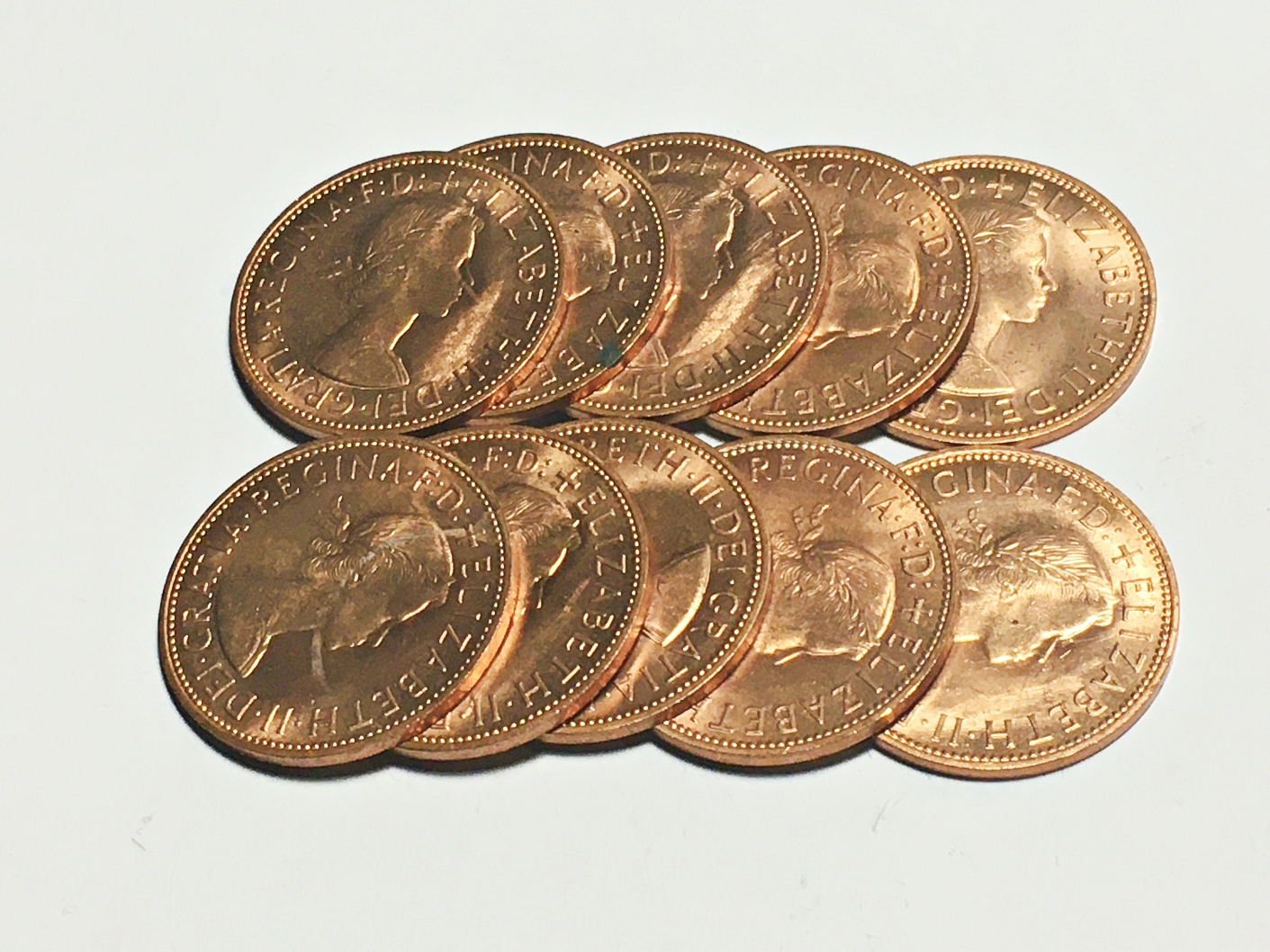 Lot of Ten High Grade 1964 Great Britain One Penny Coins | Property Room