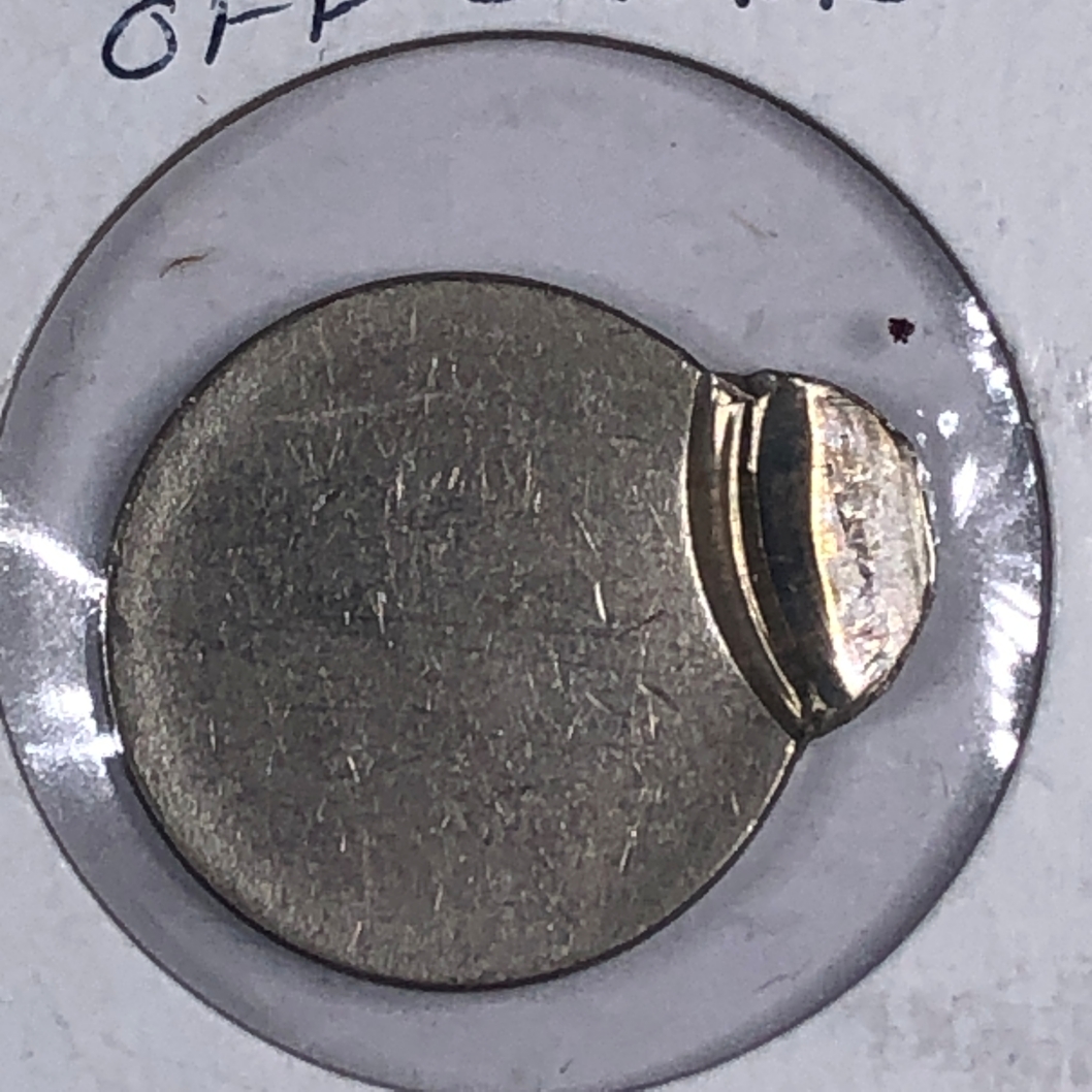 MINT ERROR*Major Off Center Nickel Planchet | Property Room