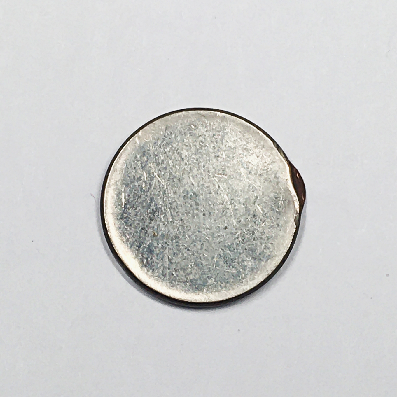 MINT ERROR*No Date Major Off Center Dime Planchet | Property Room