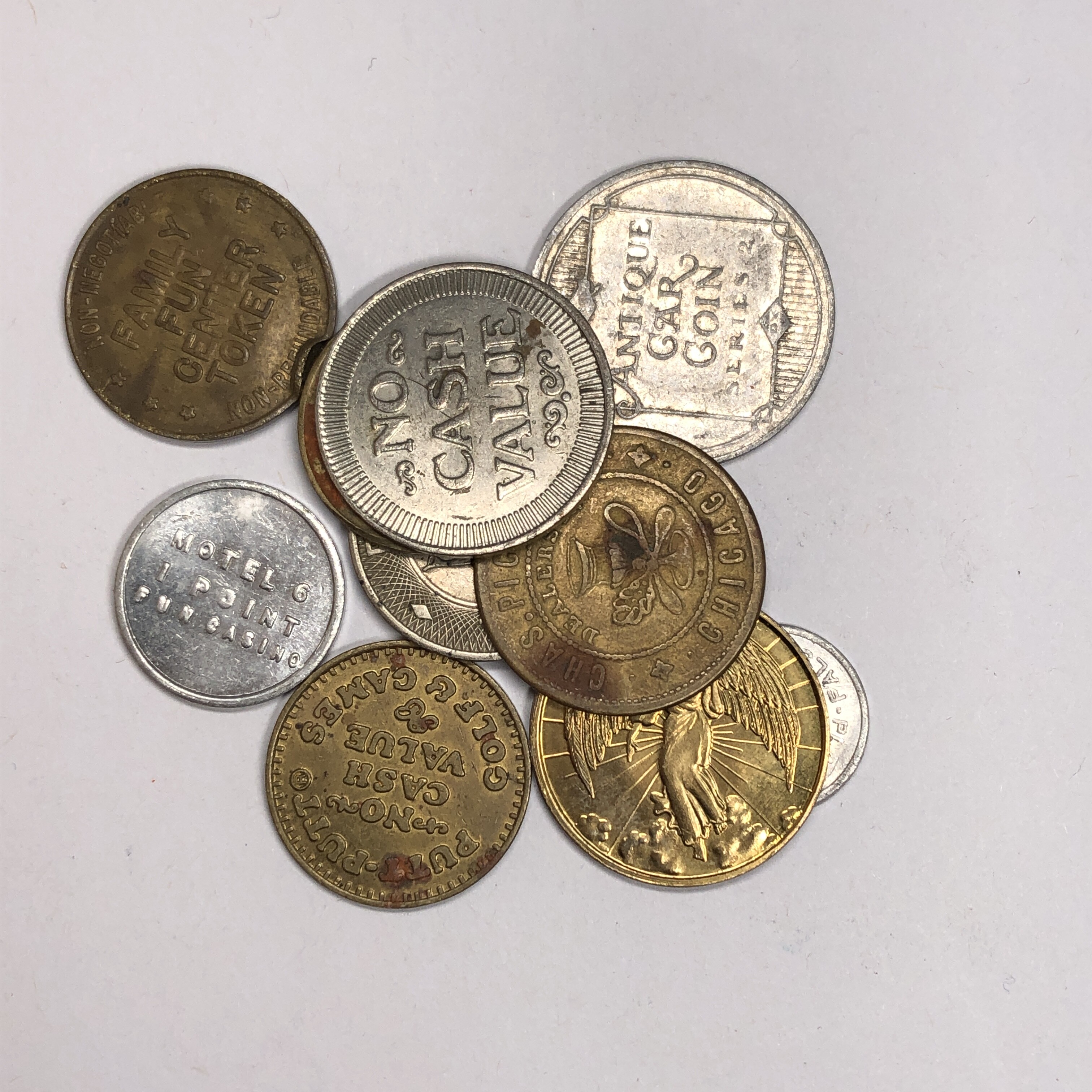 Mixed Lot of Tokens Including Guadian Angel Pocket Piece | Property Room