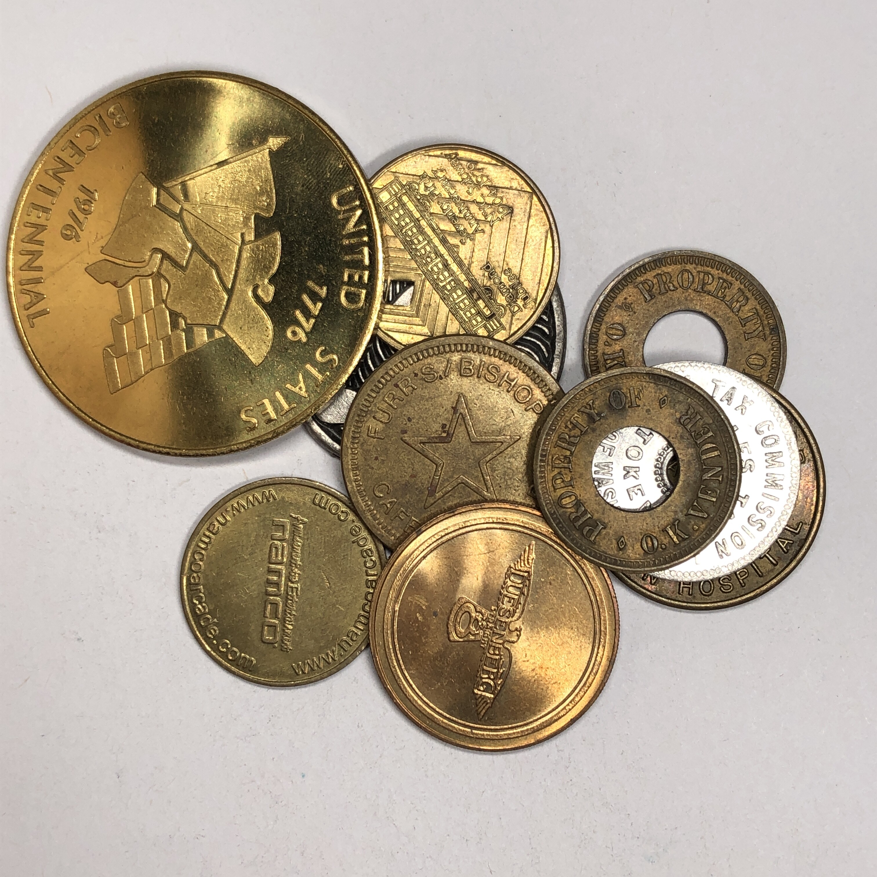 Mixed Lot of Tokens Including Holed Tokens | Property Room