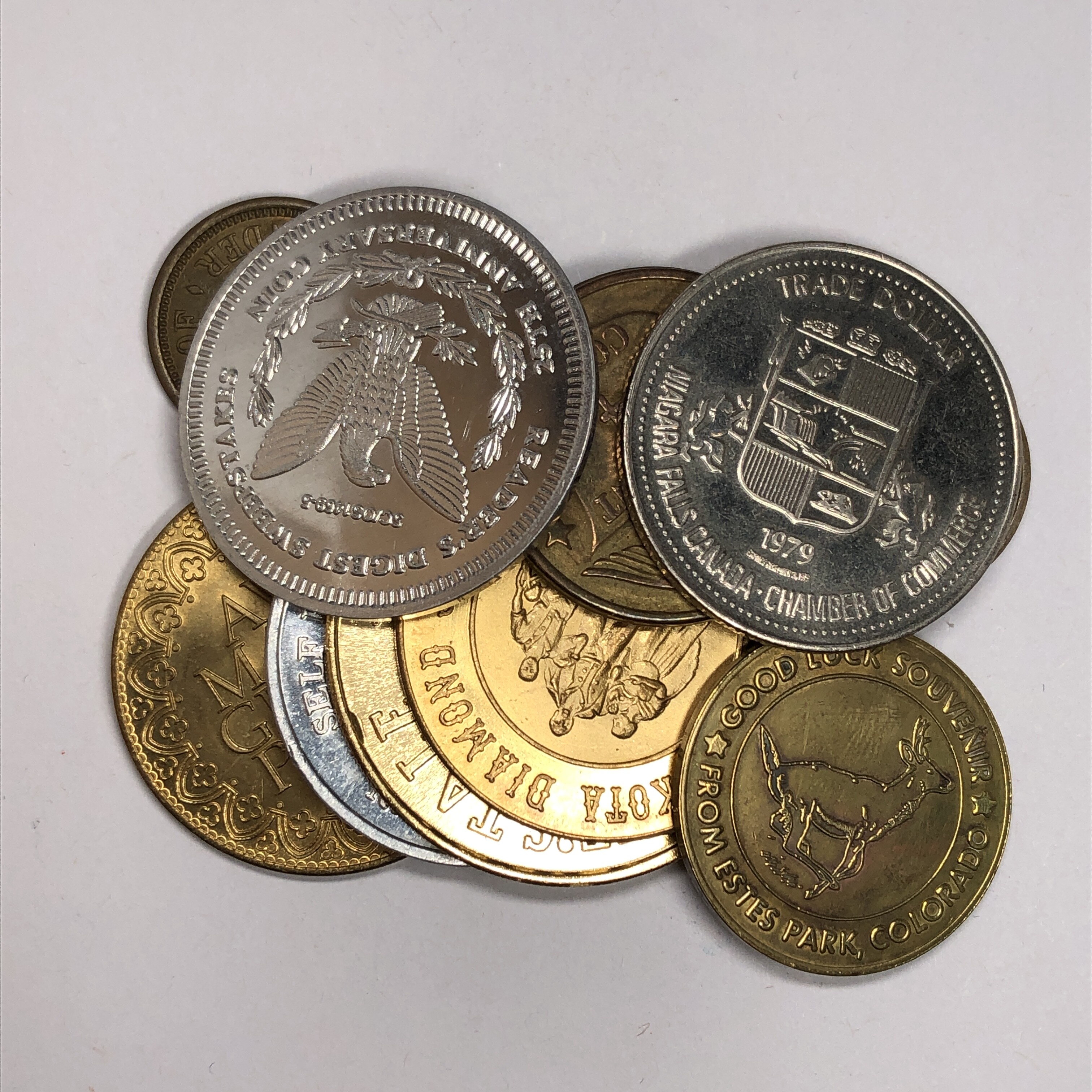 Mixed Lot of Tokens Including North Dakota Diamond Jubilee | Property Room