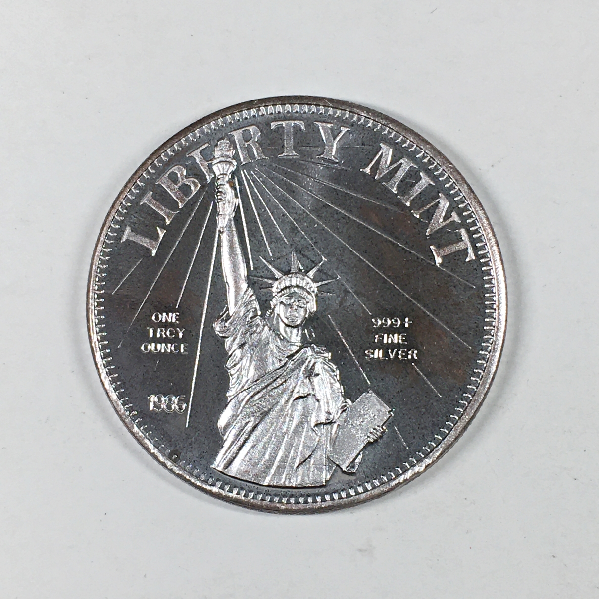 One Ounce .999+ Fine Proof Silver Round*1986 Liberty Mint*Rainbow tone ...