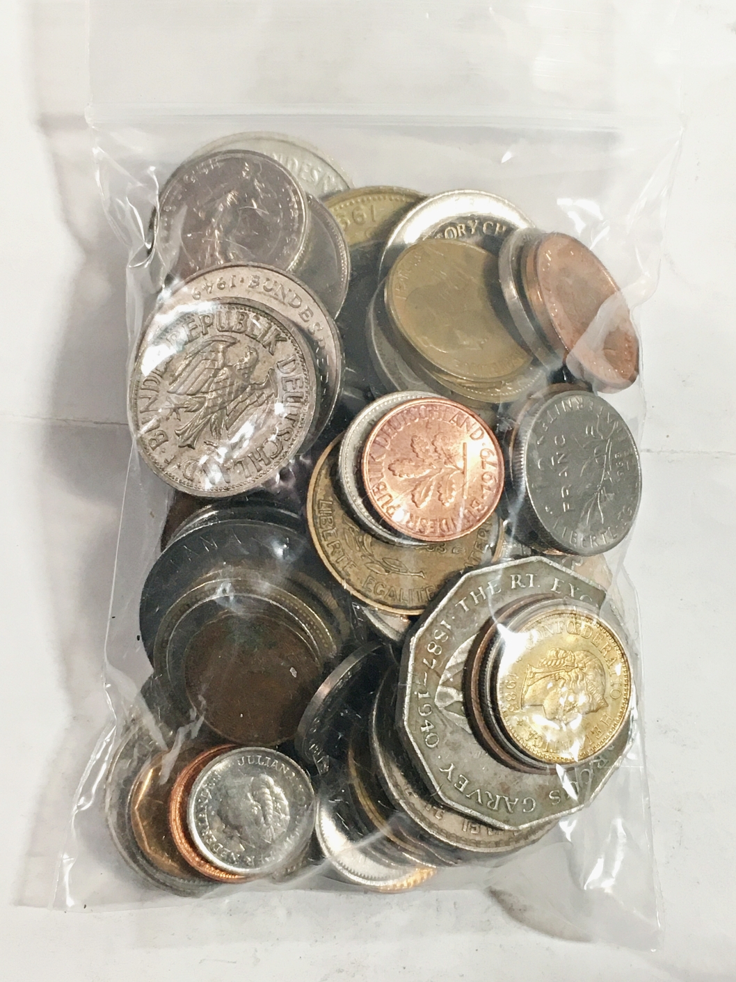 Over 13 Ounces of Mixed World Coins | Property Room