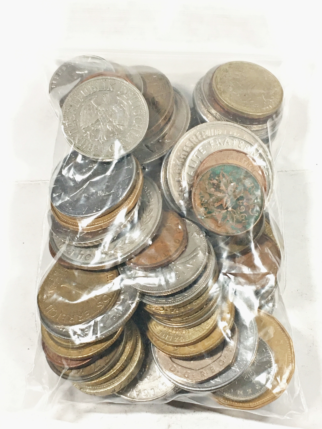Over 14 Ounces of Mixed World Coins | Property Room