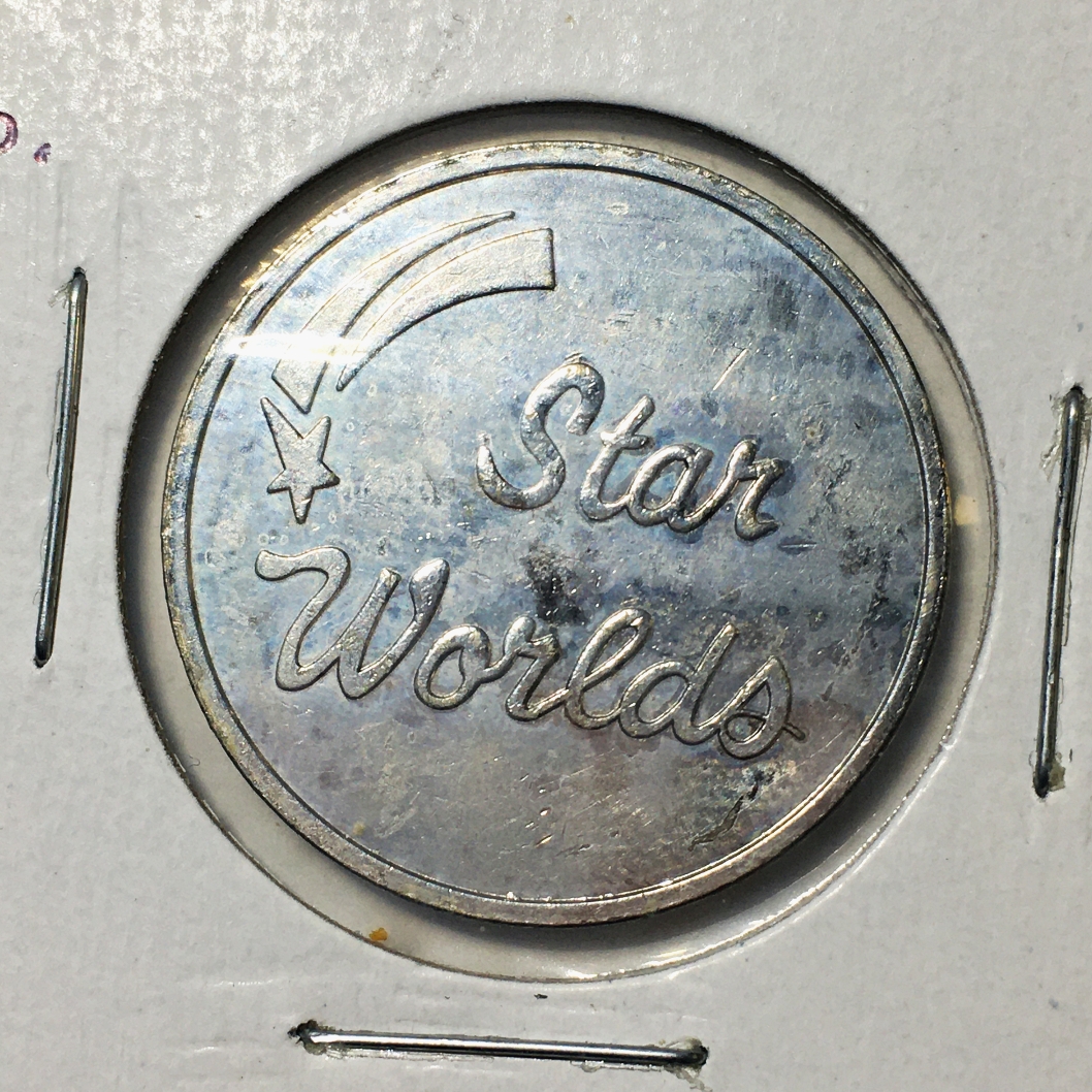 Star Worlds Vintage token with Eagle | Property Room