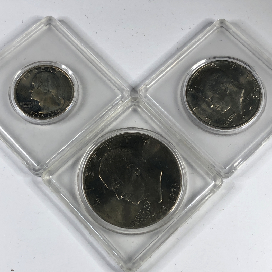 Three Presidential Type Coins: 1976 Washington Quarter, 1976 Ike Dollar and 1973-D Kennedy Half ...