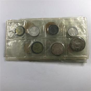 Lot of 19 World Coins*In Sealed Packets | Property Room