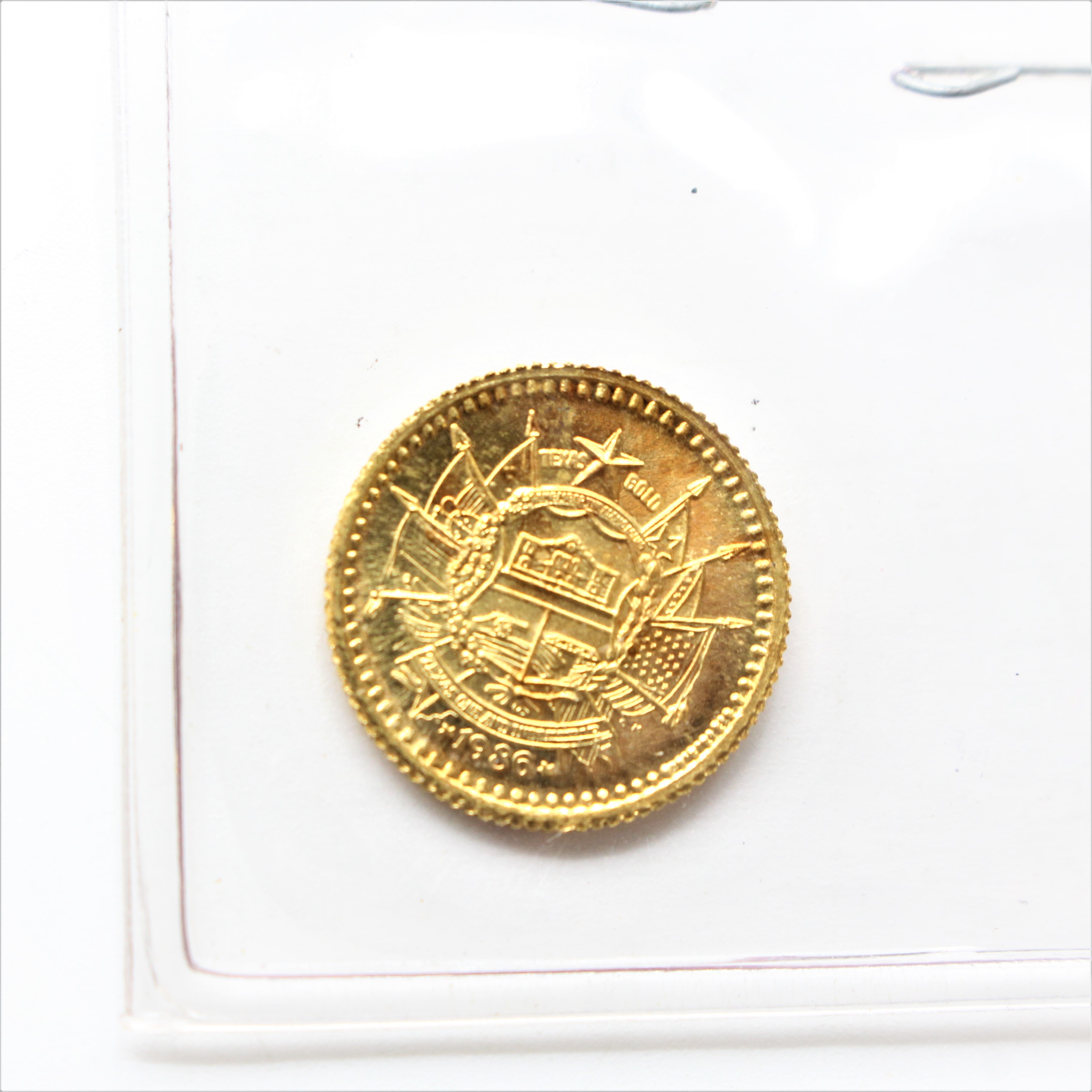 1986 99% Gold 1/10 Troy ounce State of Texas Coin | Property Room
