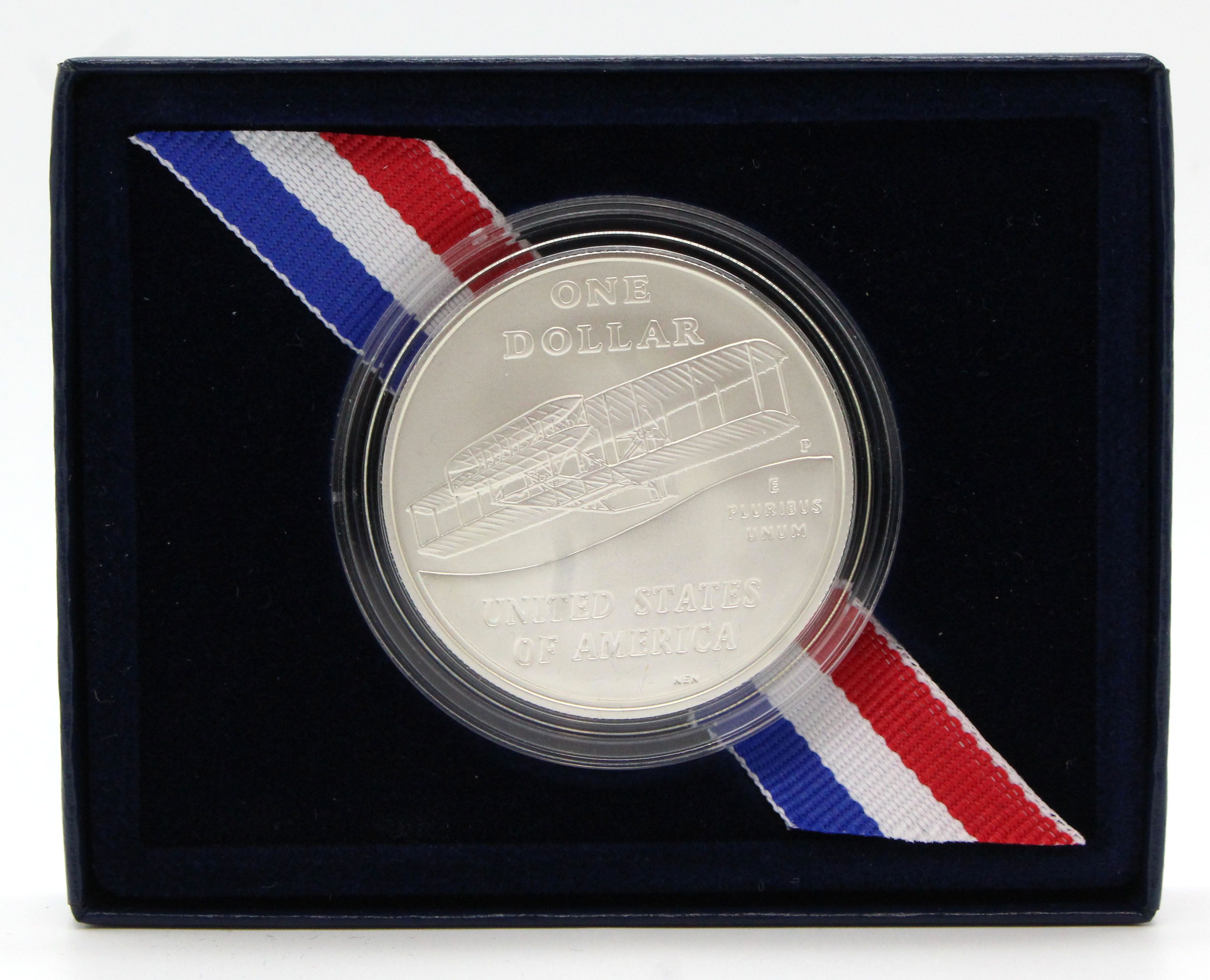 2003 First Flight Centennial Comm. Coin Unc. Silver Dollar | Property Room