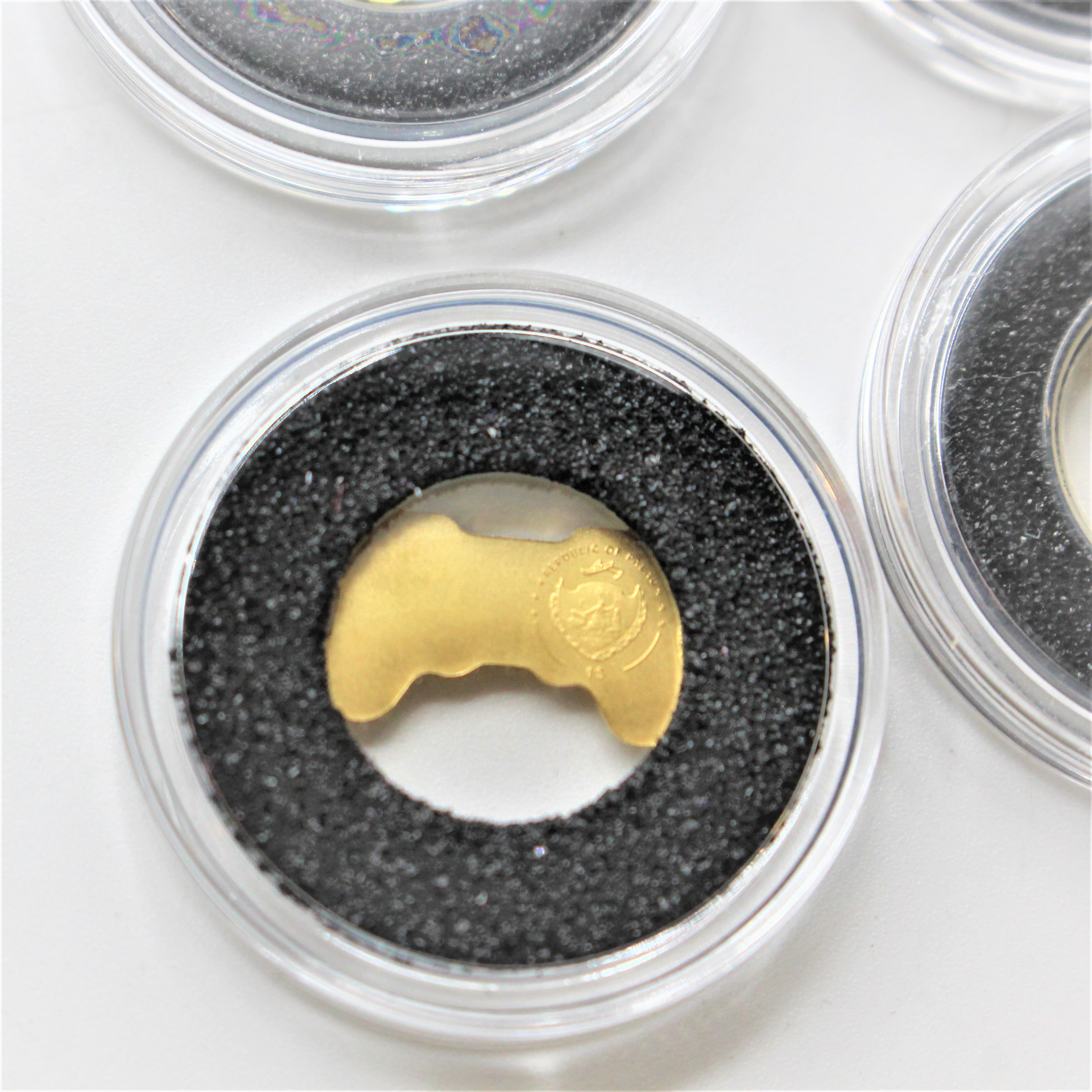 ONE Mini Gold Coin Game Controller Shaped Palau | Property Room