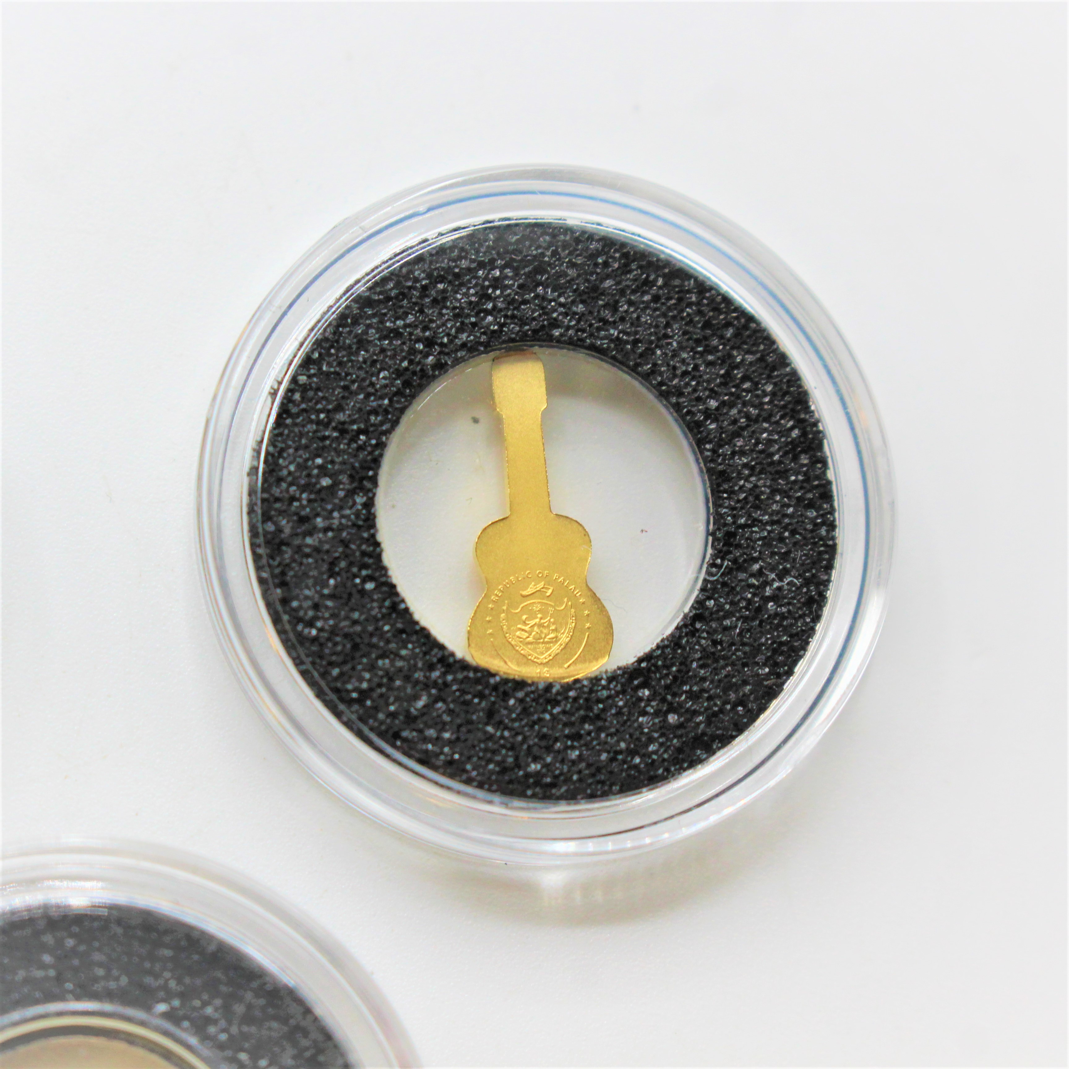 ONE Mini Gold Coin Guitar Shaped Palau | Property Room