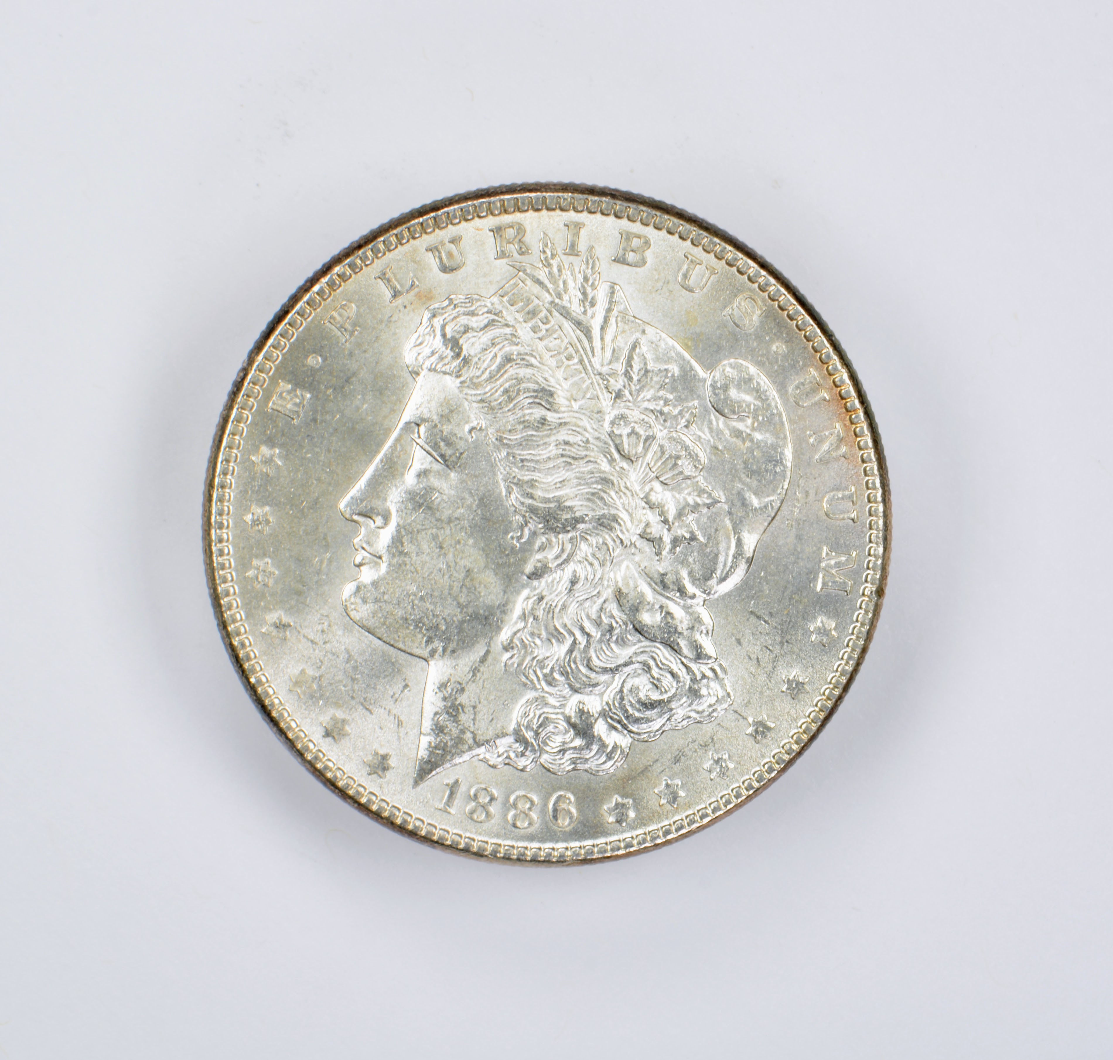 1886-P Morgan Silver Dollar $1 - Select Brilliant Uncirculated | Property Room