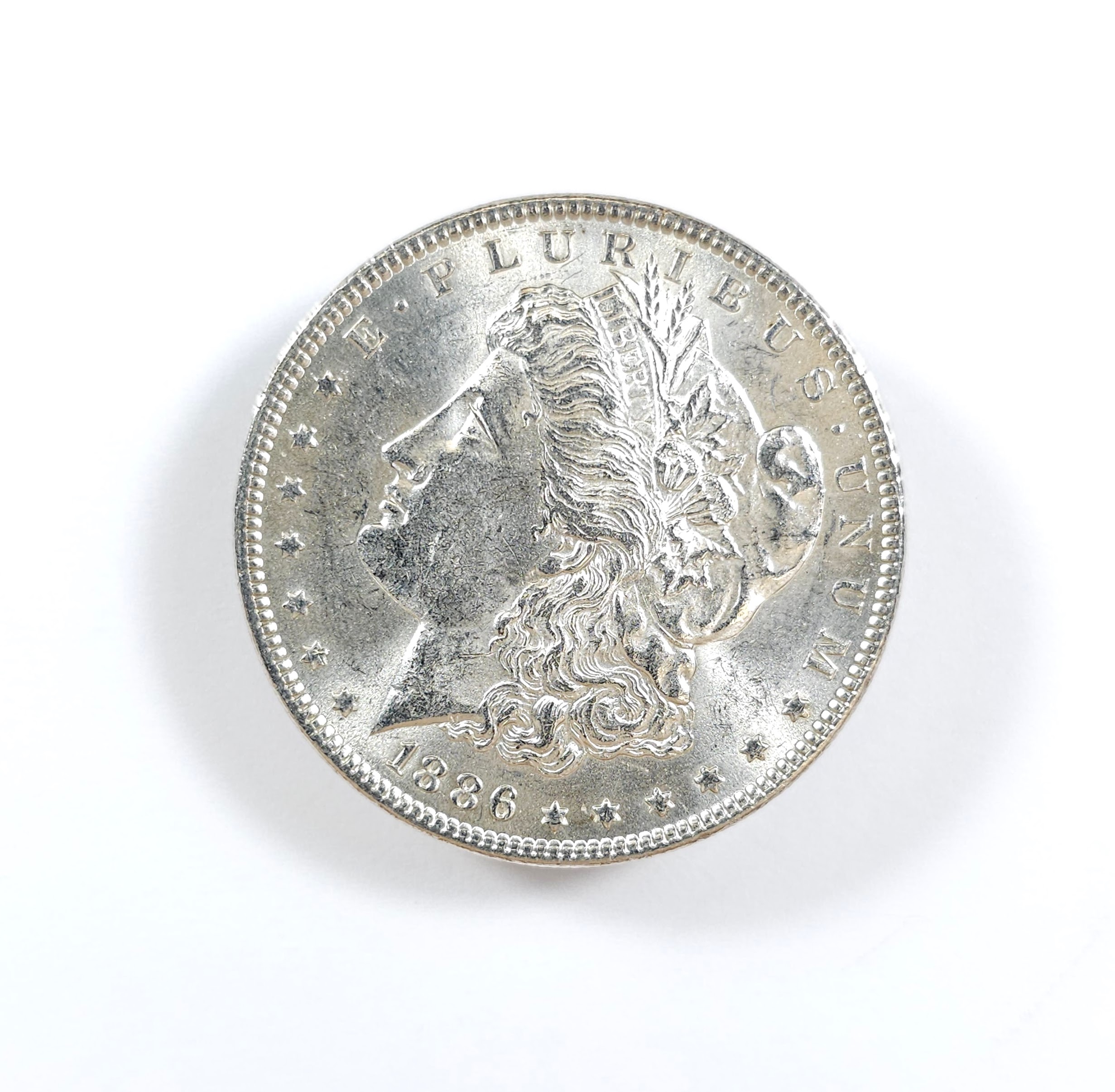 1886-P Morgan Silver Dollar $1 - Brilliant Uncirculated | Property Room