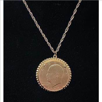 1972 Gold Plated Ike Dollar with Bezel and Chain | Property Room