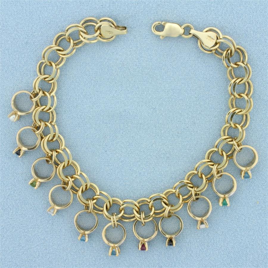 Unique Dangle Rings Charm Bracelet in 10k Yellow Gold | Property Room