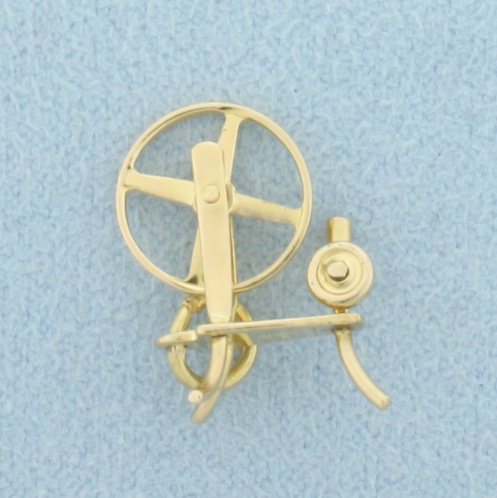 Mechanical Spinning Wheel Charm in 14k Yellow Gold | Property Room