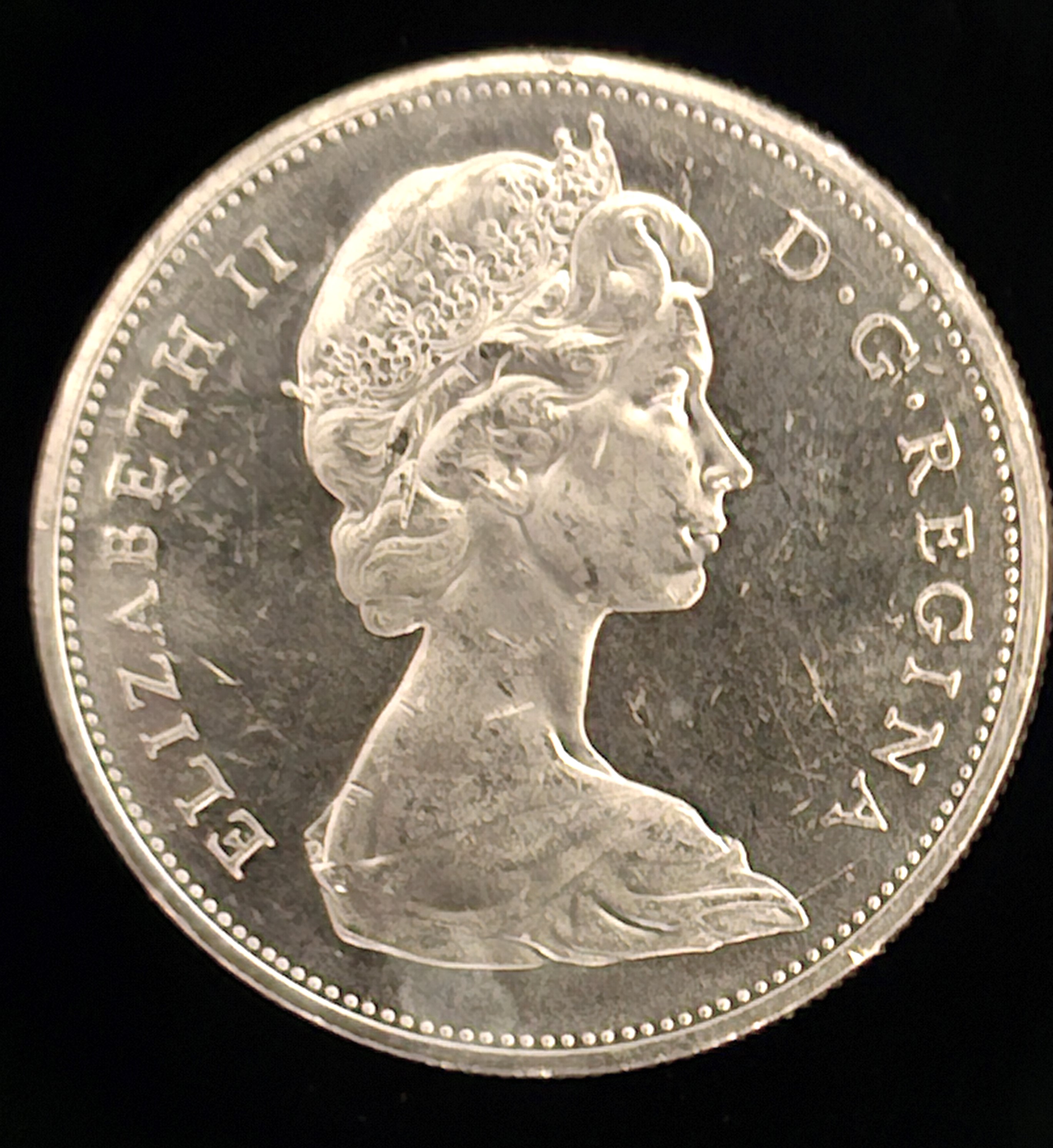 Silver Canadian $1 Dollar Coin, 1965 BU | Property Room