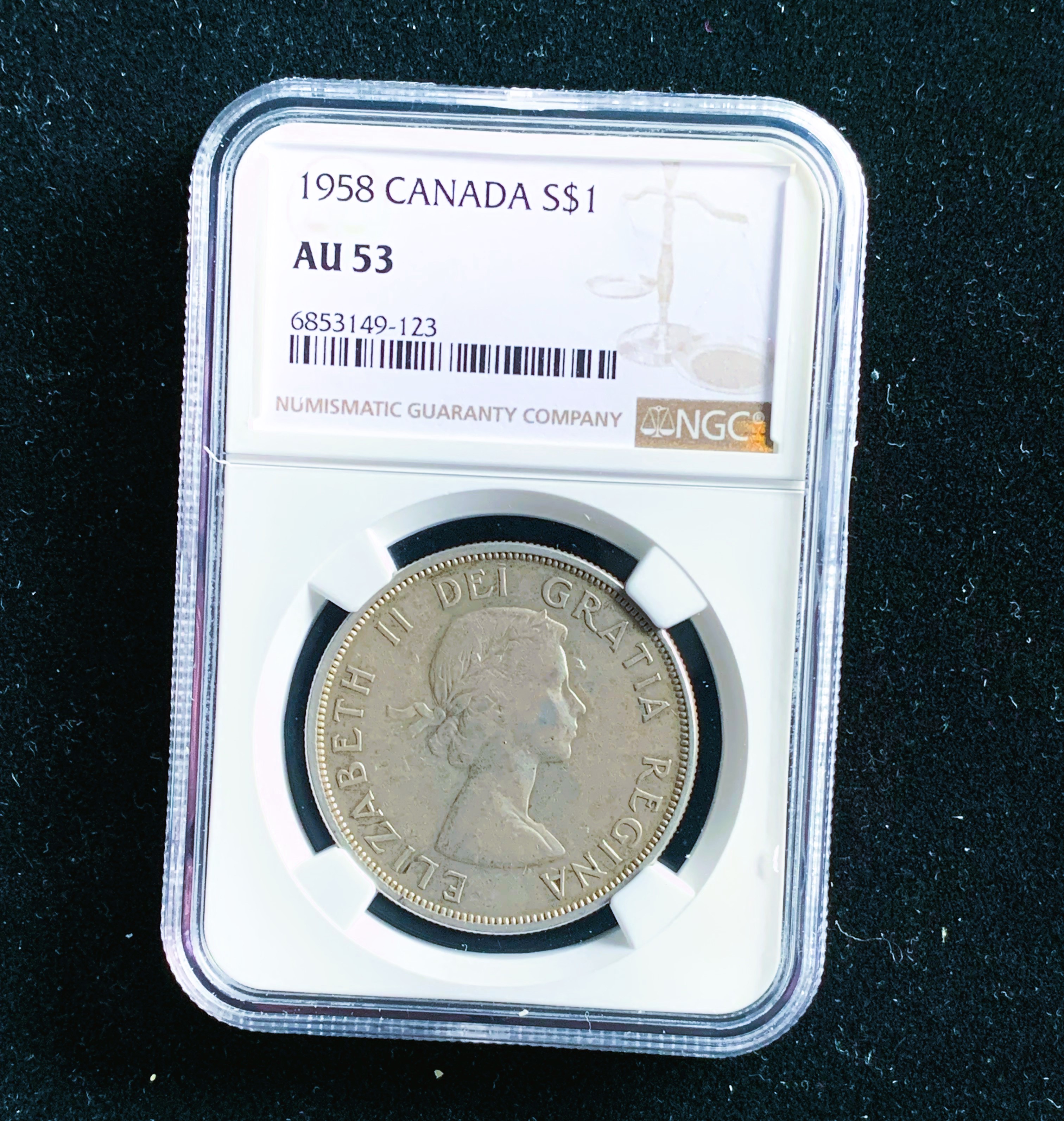 1958 CANADIAN SILVER DOLLAR COIN, NGC GRADED AU53 IN SLAB, 100 YEAR ...