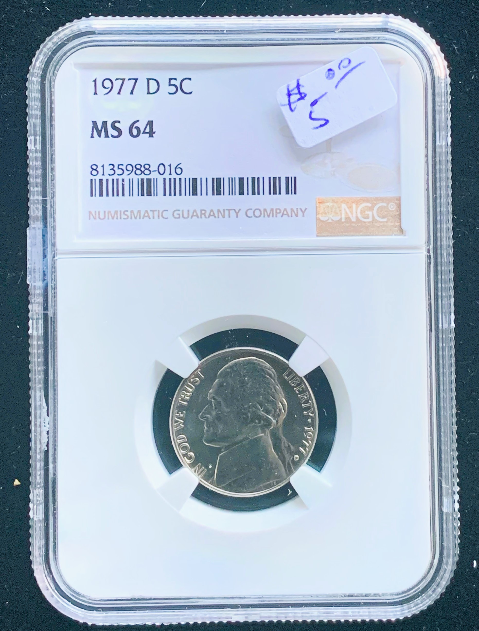 1977-D 5C NGC GRADED MS 64 COIN IN THE SLAB | Property Room