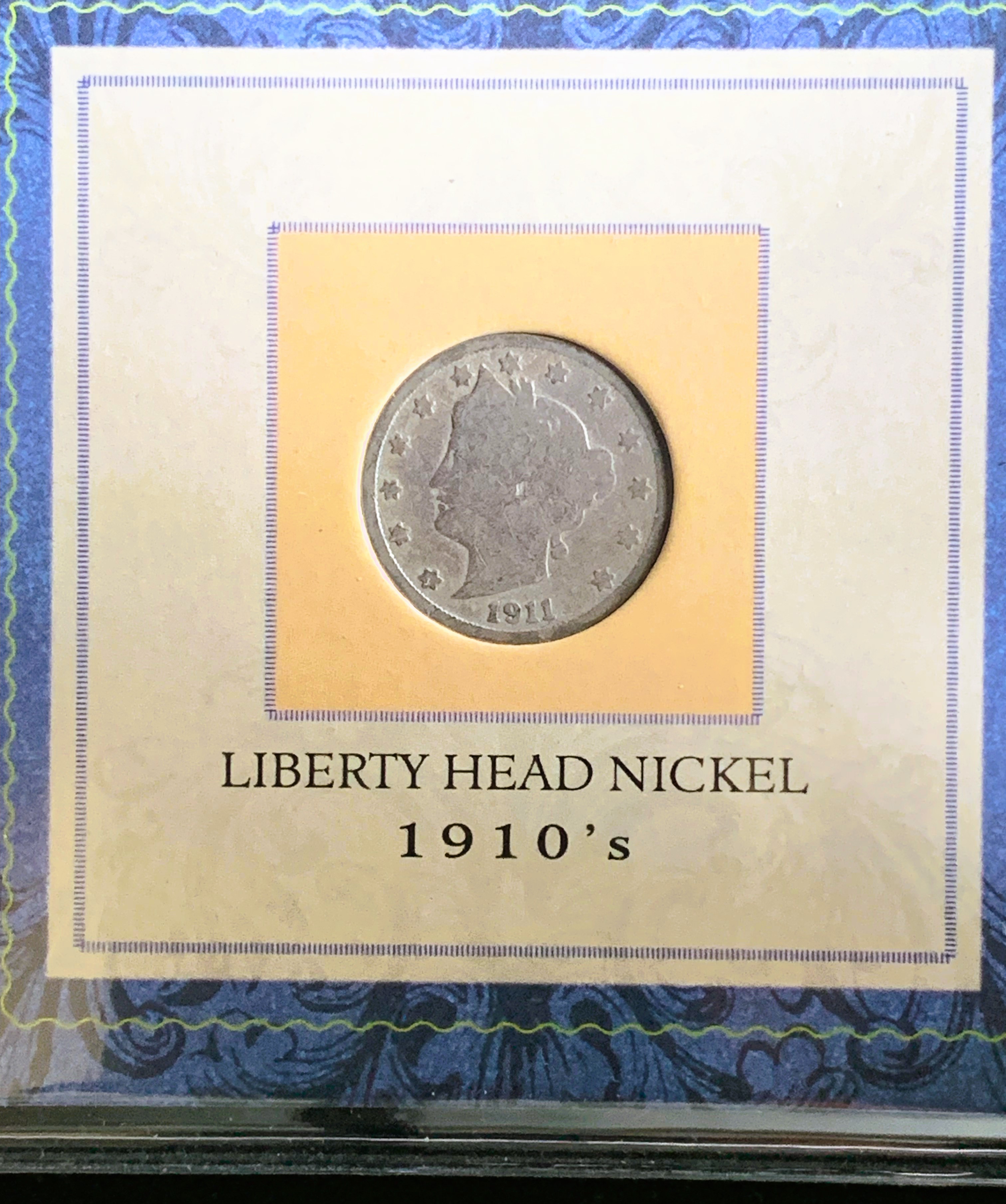 1911 LIBERTY HEAD V NICKEL IN COLLECTORS BOOKLET, NICE | Property Room
