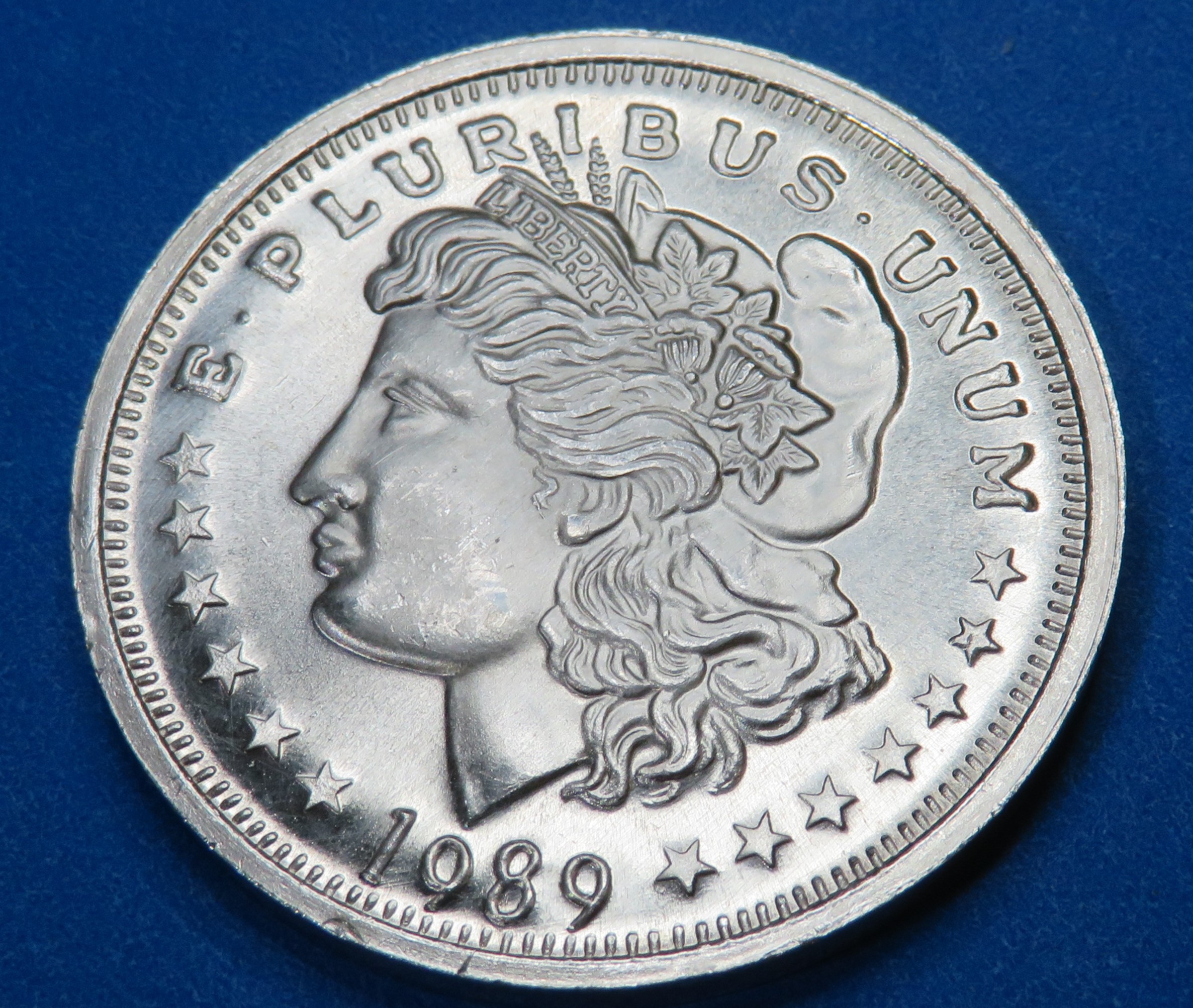 1989 Morgan Design Silver Round | Property Room