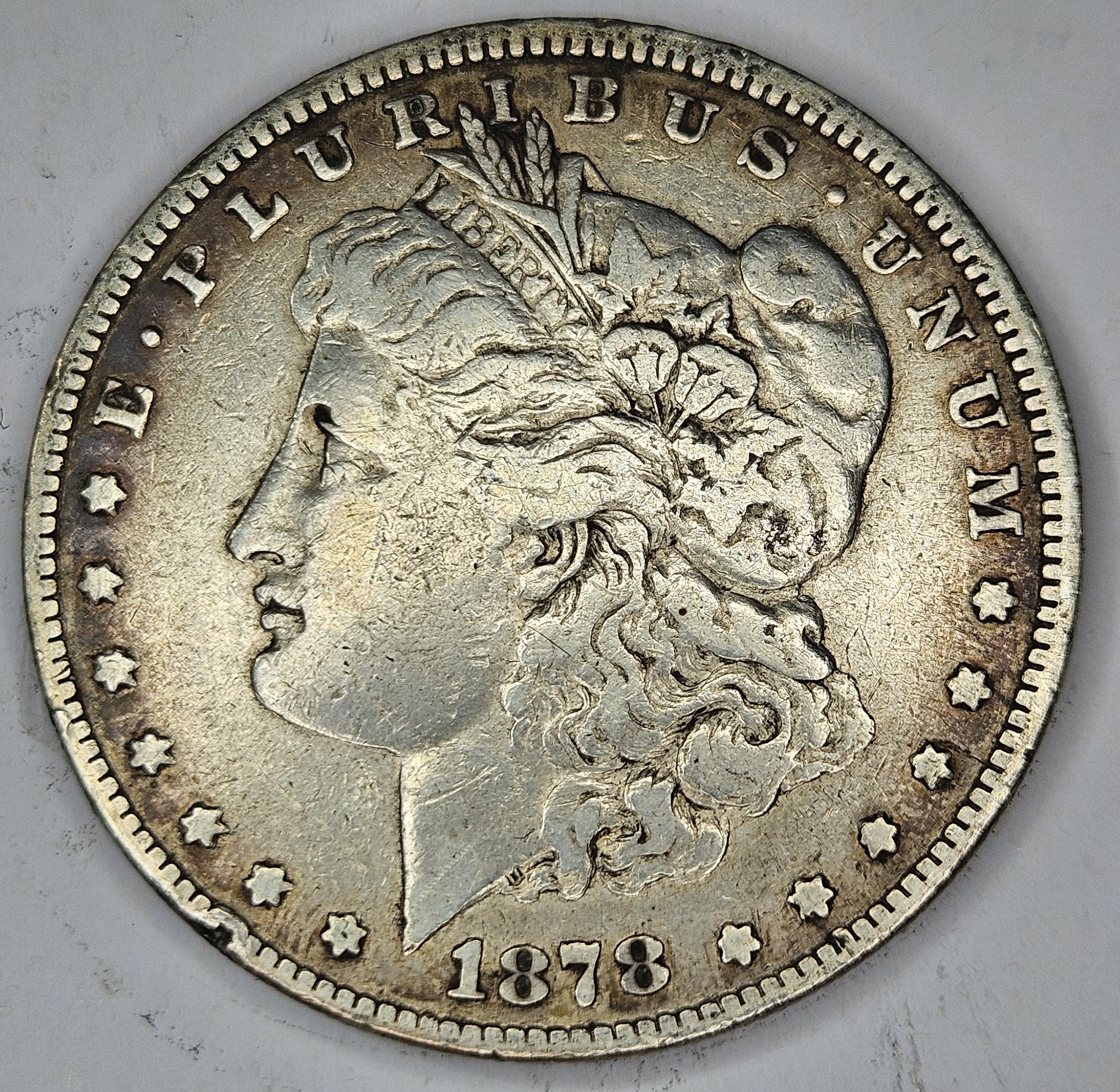 1878 7 Tail Feather Morgan Silver Dollar | Property Room